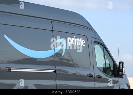 An Amazon Prime, Ford Transit 250, delivery van drives southbound on ...