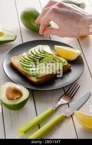 Black man cooking breakfast or lunch on kitchen at home. African ...