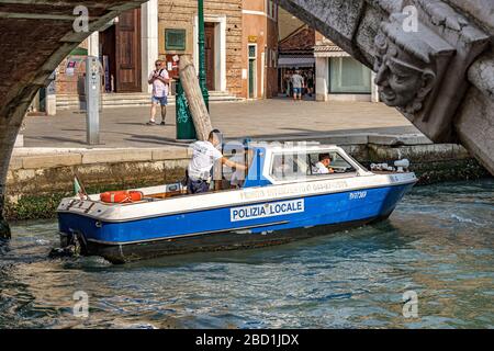 Venice, Italy. Police boat of the local police of Venice patrols on the ...