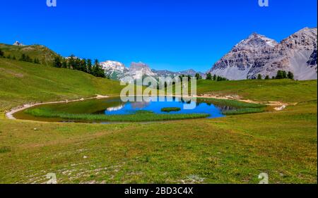 Mont Thabor and its reflection in the Lake Chavillon on Etroite Valley ...