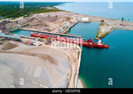Great Lakes shipping freighter loading Carmuse calcite limestone quarry ...