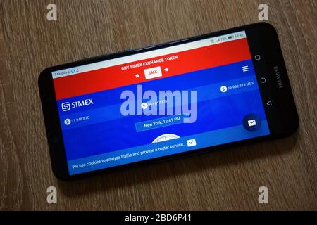 Simex cryptocurrency exchange logo displayed on smartphone Stock Photo ...