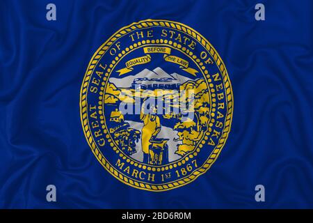 Nebraska flag on satin texture Stock Photo - Alamy
