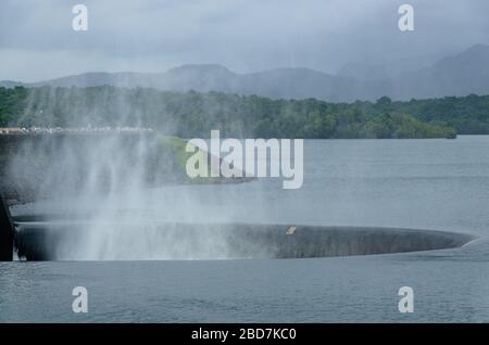 The Duckbill type (Morning Glory type) spillway in operation during ...