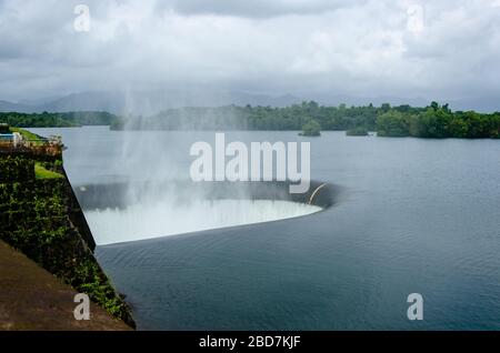 The Duckbill type (Morning Glory type) spillway in operation during ...