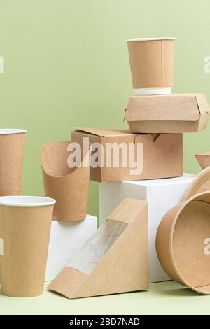 Ecological concept. On a green background on a plastic bag is a globe ...