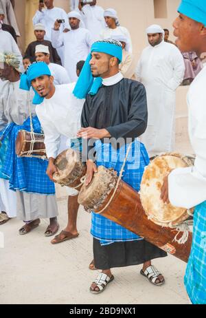 Omani musicians providing music for a tribal dance in Muscat, in the ...