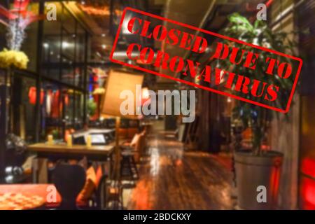 Defocused, blurred view of interior of an upmarket bar or pub, empty ...