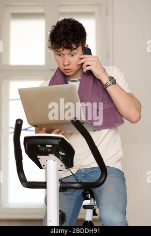 A teenager looks at her mobile phone in London, Monday, June 15, 2026 ...