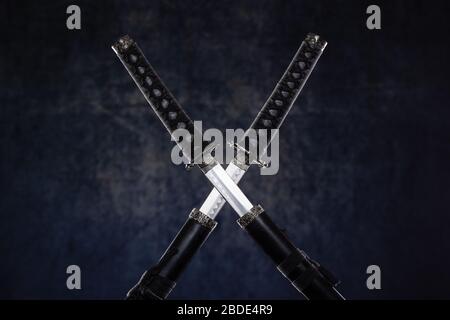 Two crossed Japanese samurai katana swords isolated on white Stock ...