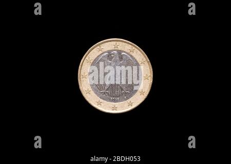 German 1 Euro coin from 2002 and pre-Euro 1 Deutschmark coin from 1990 ...