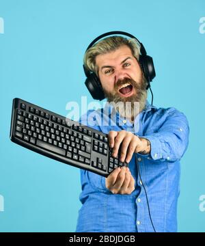 angry bearded hipster singing a song in microphone at karaoke, music ...