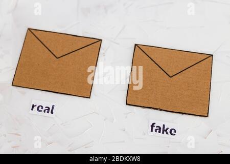 trust-wrothy vs fake emails or online scams concept, email envelop ...
