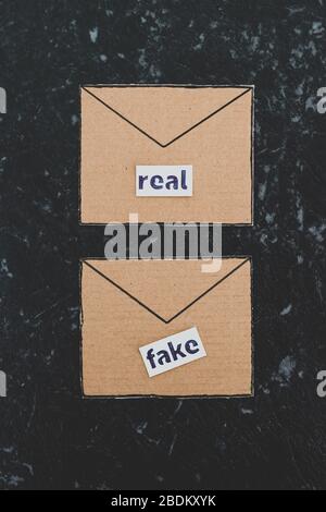 trust-wrothy vs fake emails or online scams concept, email envelop ...