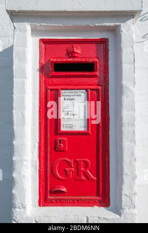 George V Post-box, or mailbox in an English village. It marks the reign ...