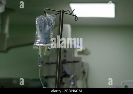 Intravenous fluid bag hanging Stock Photo - Alamy