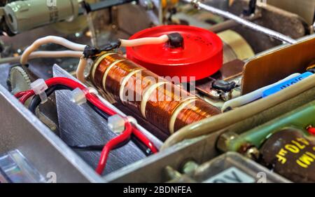 Inside view of high frequency power amplifier with capacitors, coils ...
