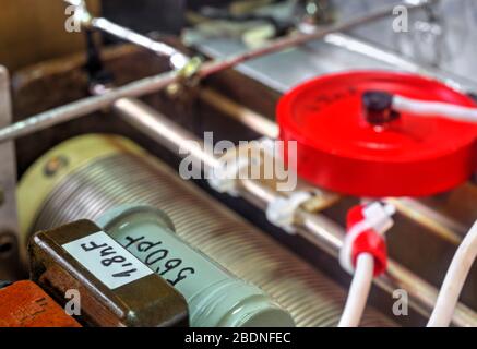 Inside view of high frequency power amplifier with capacitors, coils ...