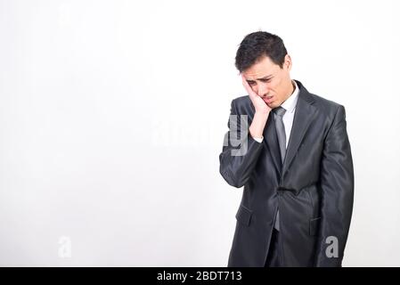 Crying man in suit. white background, full body Stock Photo - Alamy