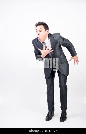 Man in suit vomiting. White background, full body Stock Photo - Alamy