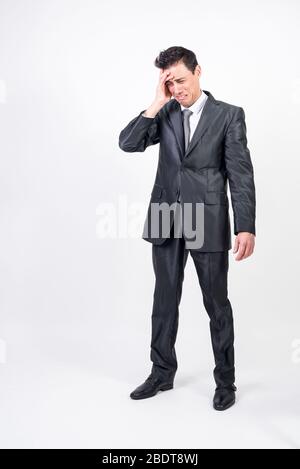 Crying man in suit. white background, full body Stock Photo - Alamy