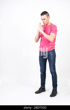 Man praying. White background, full body Stock Photo - Alamy