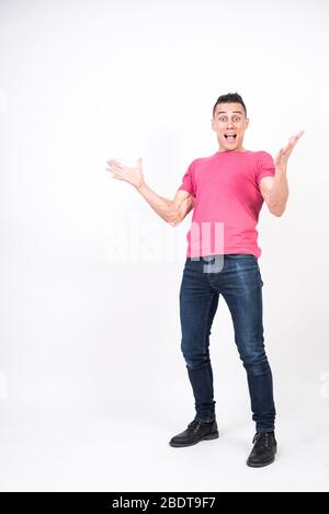 Euphoric man celebrating something. White background. Full body Stock ...