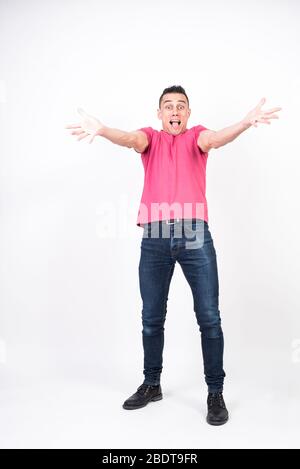 Euphoric man celebrating something. White background. Full body Stock ...