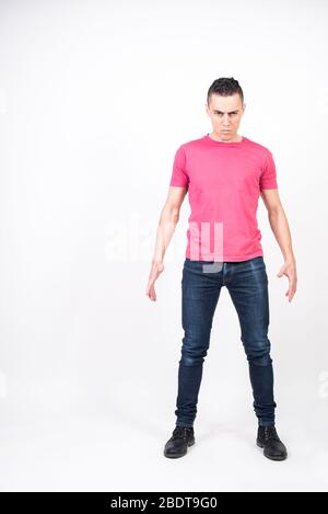Challenging man. White background. Full body Stock Photo - Alamy