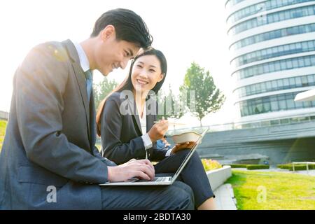 Business people use computers in the outdoor Stock Photo - Alamy