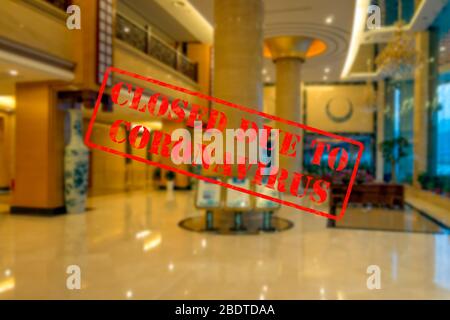 Defocused view of interior of an upmarket hotel reception or hall ...