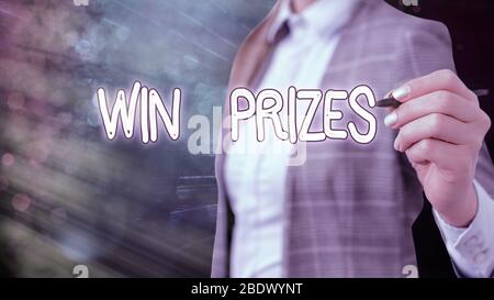 Writing note showing Win Prizes. Business concept for something given ...
