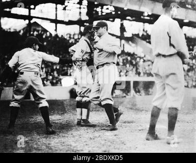 Baseball legend Babe Ruth (1895-1948) holding a baseball bat in a ...
