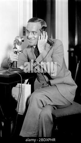 Al Jolson, a famous American singer and actor, is pictured with his son ...