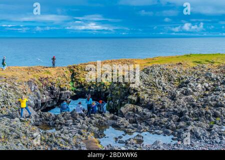 The stone bridge. Arnarstapi. Snaefellsnes peninsula. Iceland Stock ...