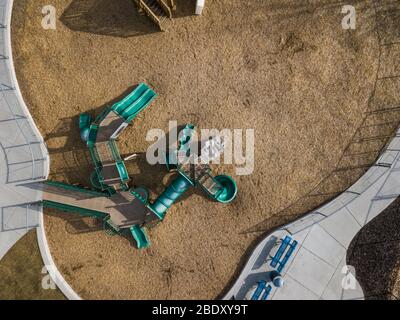 Overhead aerial of vacant elementary school playground and surrounding ...