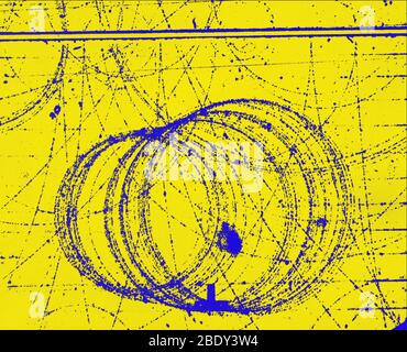 Circular track of 42 Meu positron in 12,000 gauss magnetic field. The ...