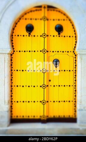Spiked wooden door in the medina Stock Photo - Alamy
