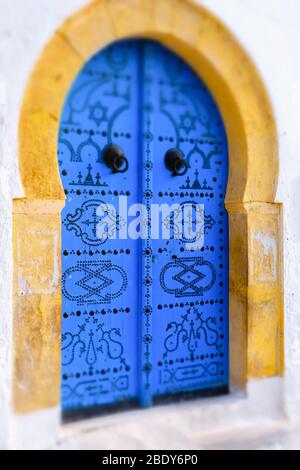Spiked wooden door in the medina Stock Photo - Alamy