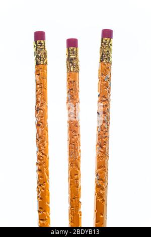 three erasers on white background Stock Photo - Alamy