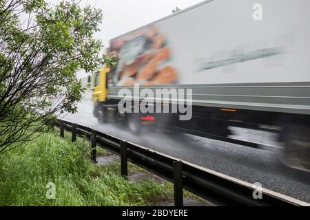 Morrisons delivery lorry, truck in heavy rain on A19 dual carriageway ...