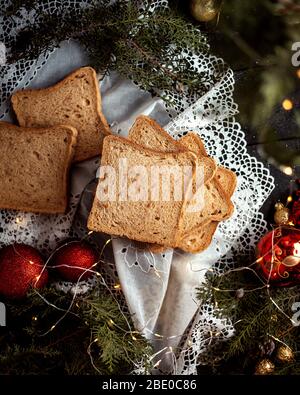 sliced bread and new year toys on the table Stock Photo - Alamy