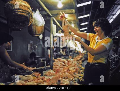 A dependent wife of a crewman from the guided missile cruiser USS ...