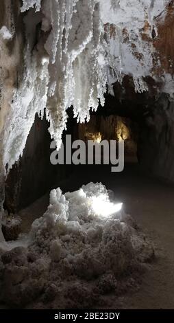 White salt stalagmite Stock Photo - Alamy