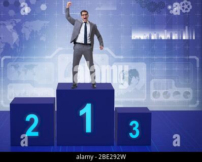Businessman taking first place in competition Stock Photo - Alamy