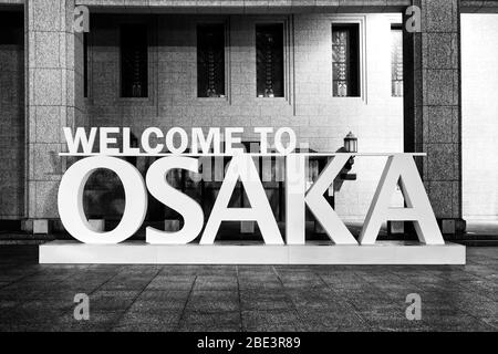 Welcome to Osaka sign at the public building of the Town Hall in Osaka ...