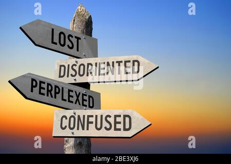 Lost, disoriented, perplexed, confused signpost Stock Photo - Alamy