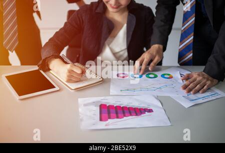 Businessman working reading documents graph financial to job succes ...