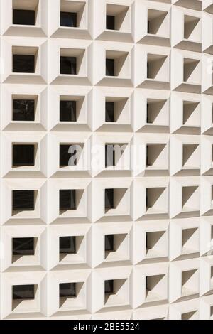 Square openings in a curved concrete wall Stock Photo - Alamy