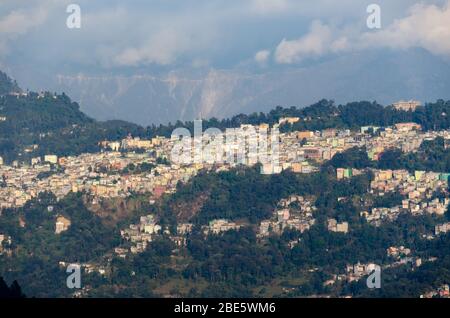 View of cluster of houses of Gangtok city nestled on mountain slope as ...